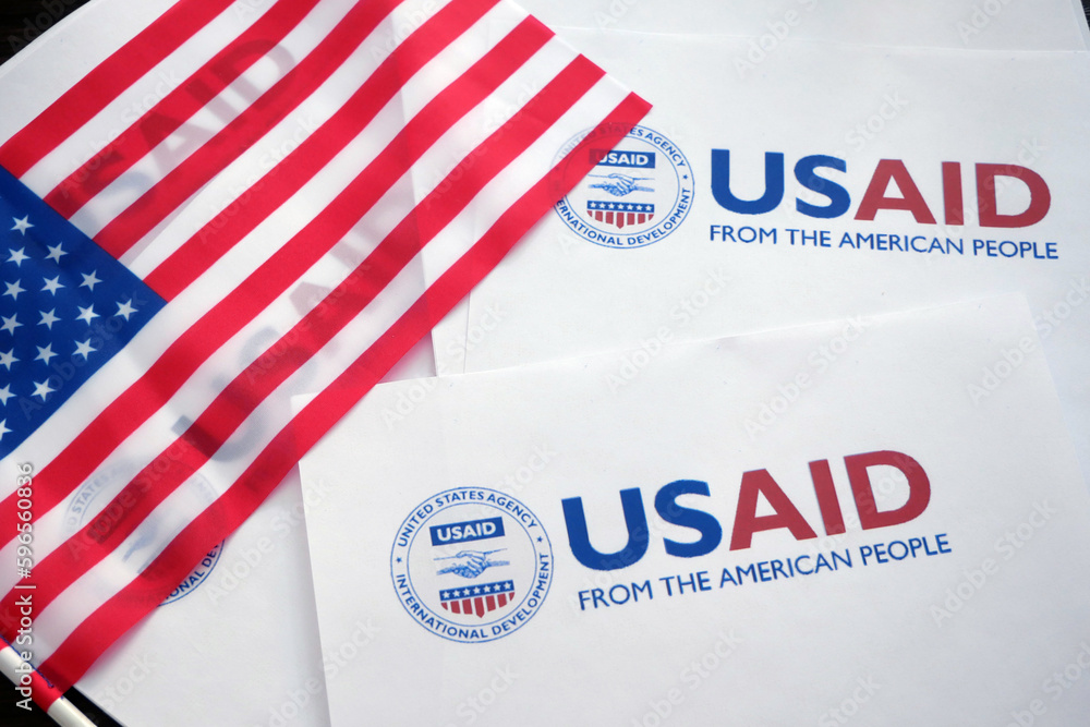 Kiev, Ukraine - 02 12 2023: USAid logo and US flag, USAid is USA agency ...