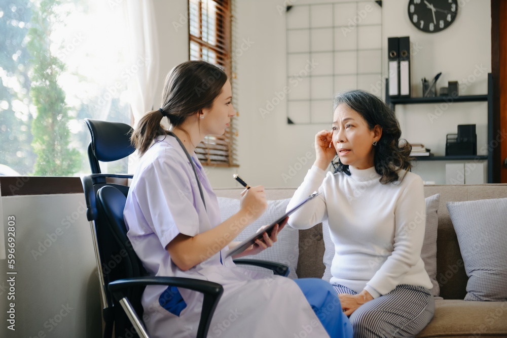medical doctor holing patient's hands and comforting her.Kind doctor ...