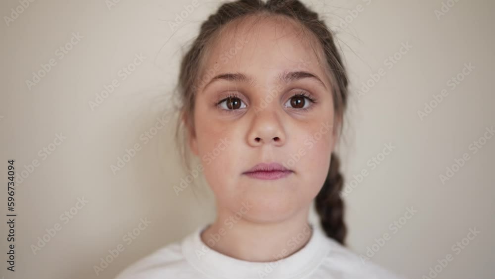 Video „portrait child girl looking indoors at the camera. happy family ...