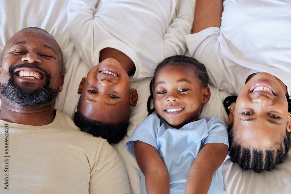 Happy african american family relaxing together and bonding at home ...