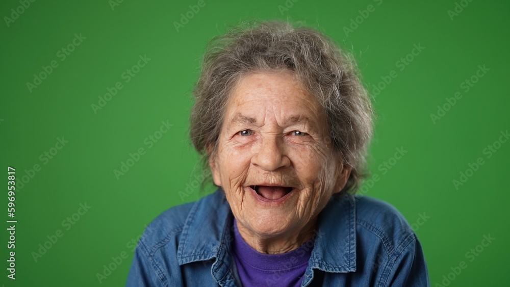 Funny crazy closeup portrait of happy laughing elderly senior old woman ...