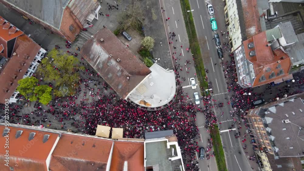 Birds eye rotating Aerial view : Audience and fans of FCK Football Club ...