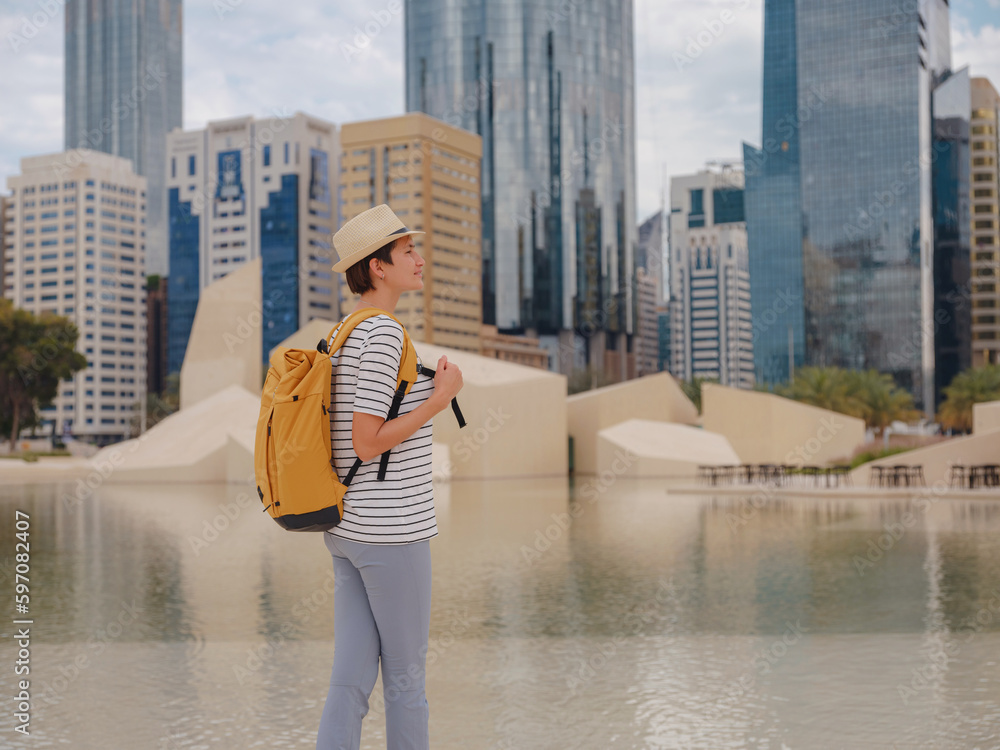 travel to the United Arab Emirates, Happy young asian female traveler ...