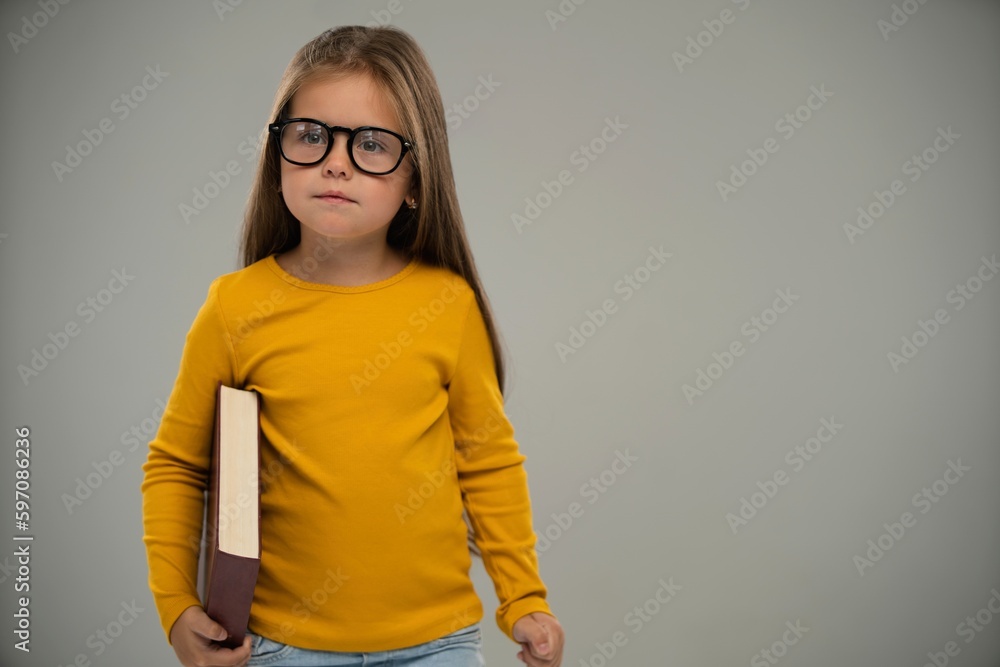 Serios little kid girl 5-6 years old isolated on white background ...