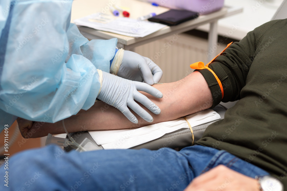 man donor in medical mask for bone marrow donation blood in laboratory ...