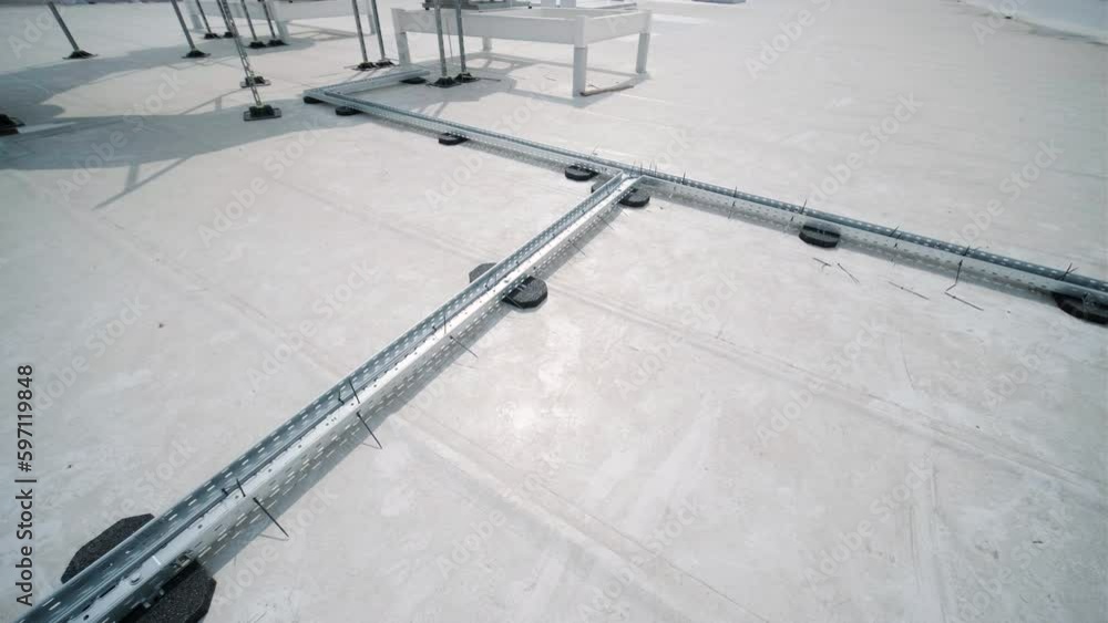 Installation of wiring on the roof. Wires in conduit that are laid ...