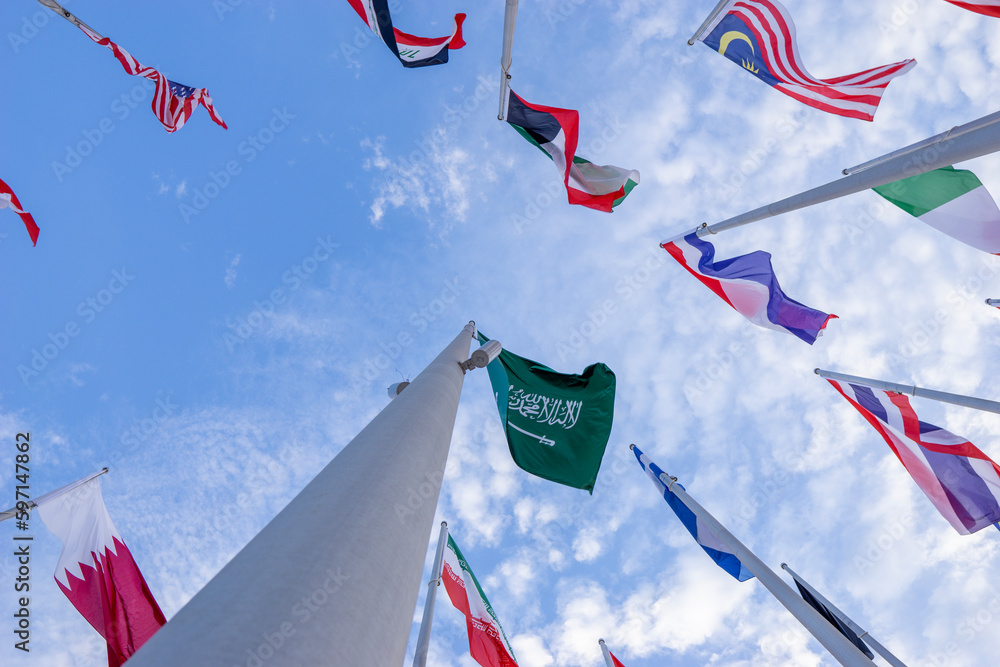 Doha, Qatar - April 25, 2023: Flags of countries in the old port of ...