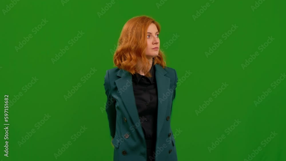 Stressed angry woman screaming at chromakey background looking at ...
