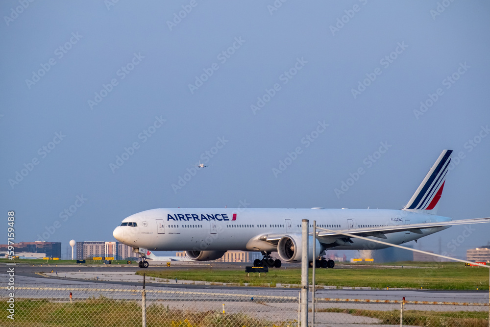 Close view of Air France airlines Boeing 777-300 airplane on a runway ...