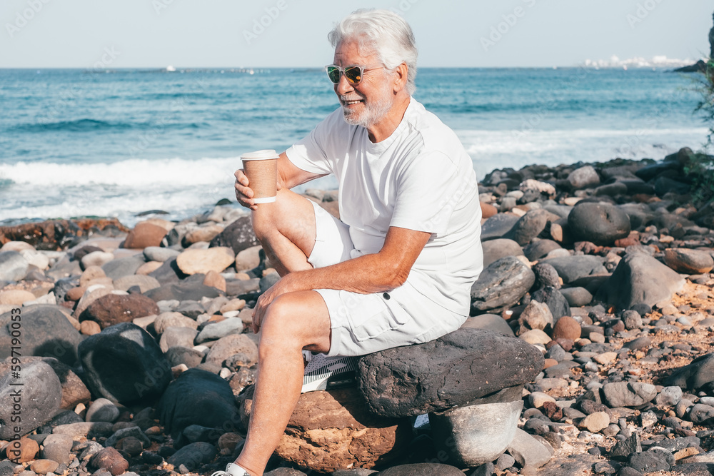 Vacation Retirement Lifestyle at Sea, Senior Man Sitting Relaxing at ...