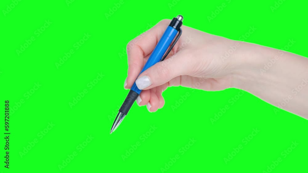 Pen in hand showing writing isolation, green screen background vídeo de ...
