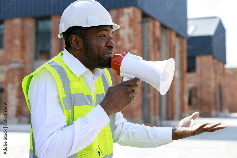 Annoyed male boss shouting in megaphone with aggressive facial ...