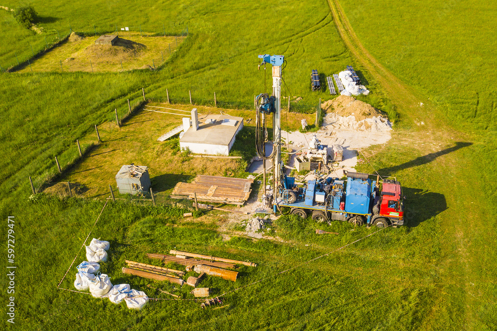 Aerial view of water well drilling. Drilling rig building new ...