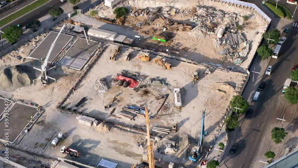 DUBAI, UAE - CIRCA 2022: concrete mixer machinery pouring concrete to ...