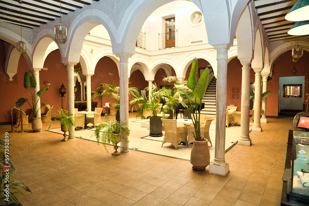 Beautiful interior courtyard with columns and plants of the reception ...