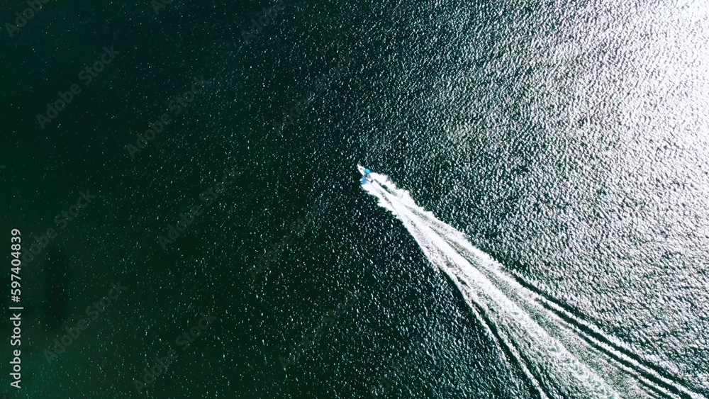 BUZZARDS BEACH EAST CAPE BCS MEXICO-2023: A Boat Traveling Across A ...