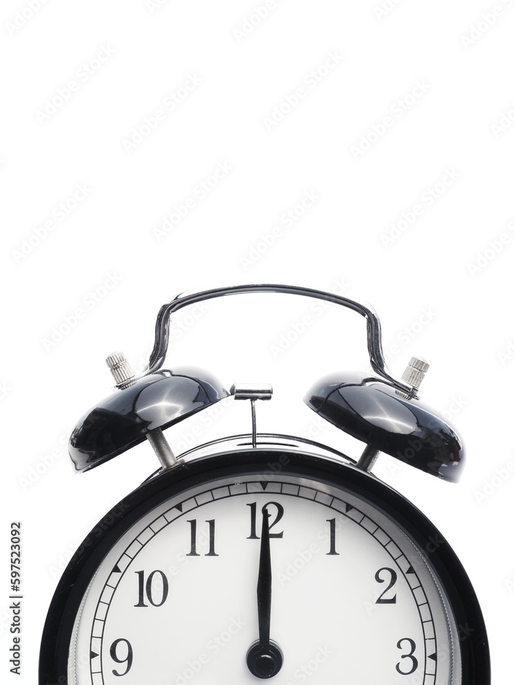 Black retro alarm clock at 12 o clock on a white background with space ...