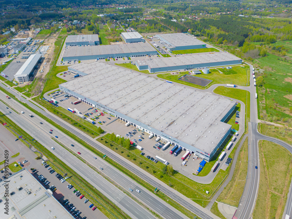 Aerial view of the logistics park with warehouse, loading hub and many ...