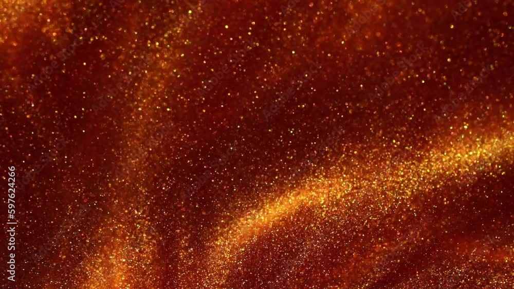 Stockvideon Falling Gold Particles in Red Liquid. Gold dust particles ...