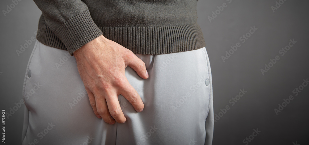 Hand holding crotch. Urinary Tract Infection. Cystitis Stock Photo ...