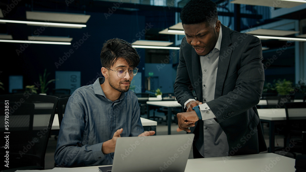 Annoyed furious african businessman shout on arabian worker angry man ...