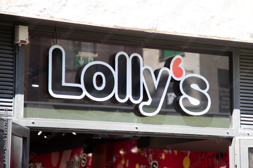 lolly’s candy bar sign text and brand logo shop wall facade Candies ...