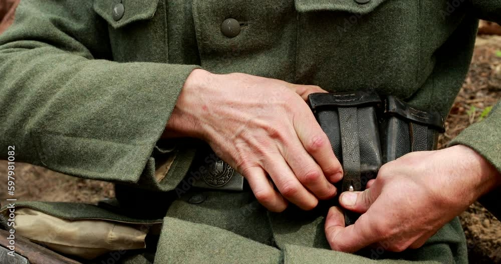 World War II German wehrmacht Soldier Preparing His Ammunition - Rifle ...