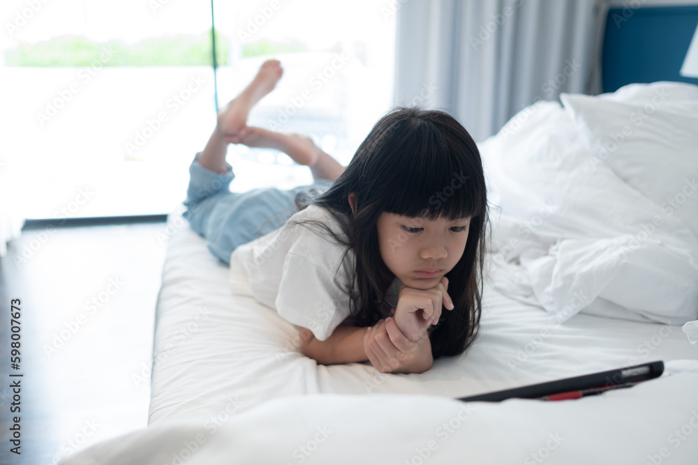 chinese child addicted phone, asian girl playing smartphone, kid ...