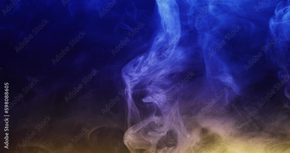 Colored smoke moves beautifully against a black background. Mockup for ...
