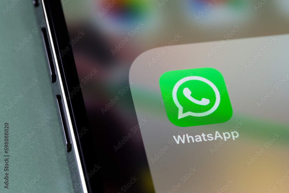 WhatsApp mobile app on the screen smartphone iPhone. WhatsApp is a ...