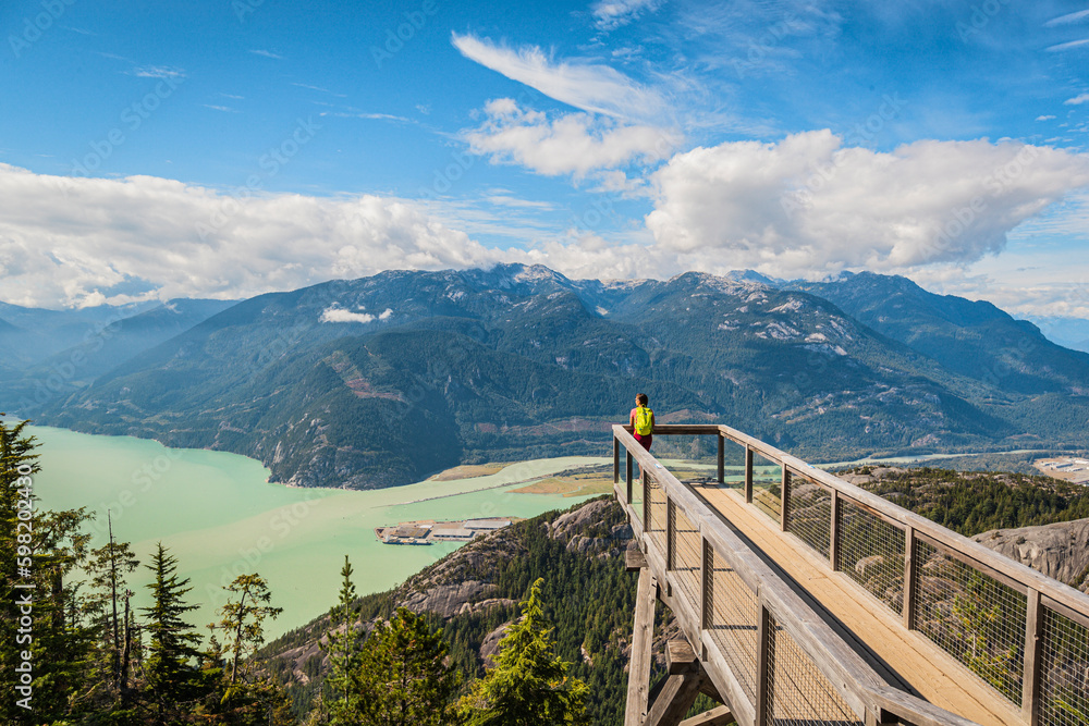 Squamish, British Columbia nature with hiking woman hiker in looking at view of amazing ...