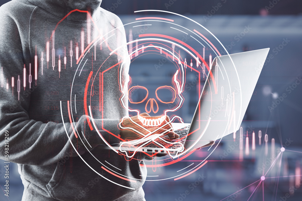Close up of hacker hands using laptop computer with abstract glowing skull hologram on blurry ...