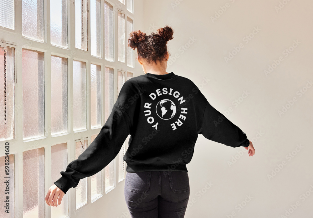 Mockup of customizable sweatshirt being modelled by woman, rear view ...