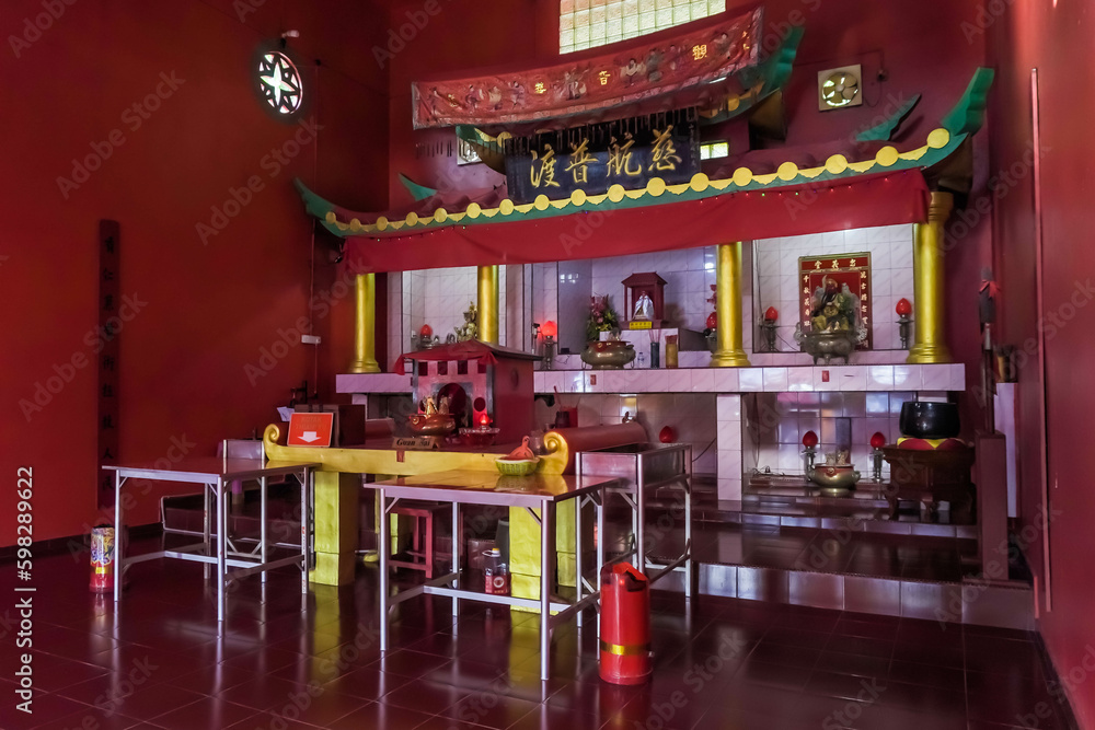 Interior view of red temple or shrine with Chinese buildings theme with ...