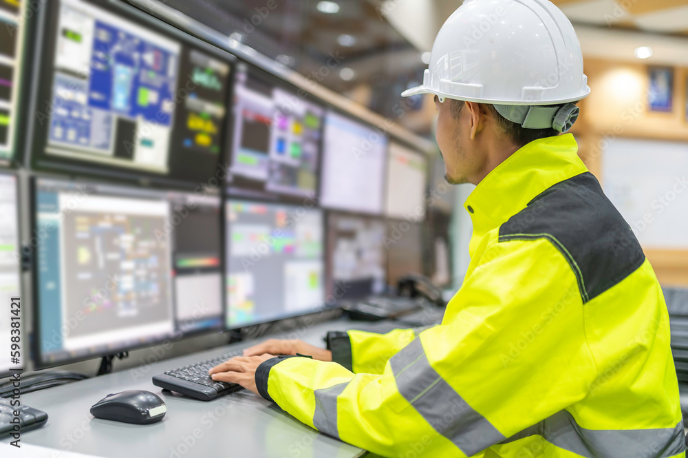 Engineer working at control room,Manager control system,Technician man ...