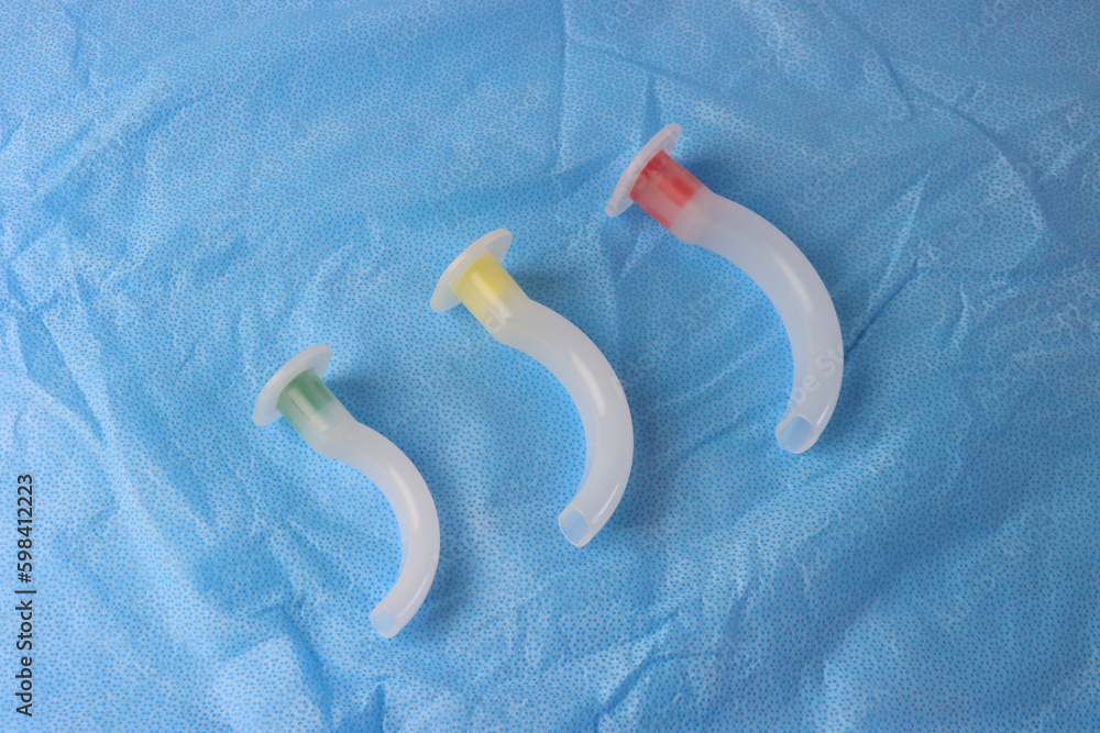 Different sizes of an Oropharyngeal airway above a surgical field Stock ...