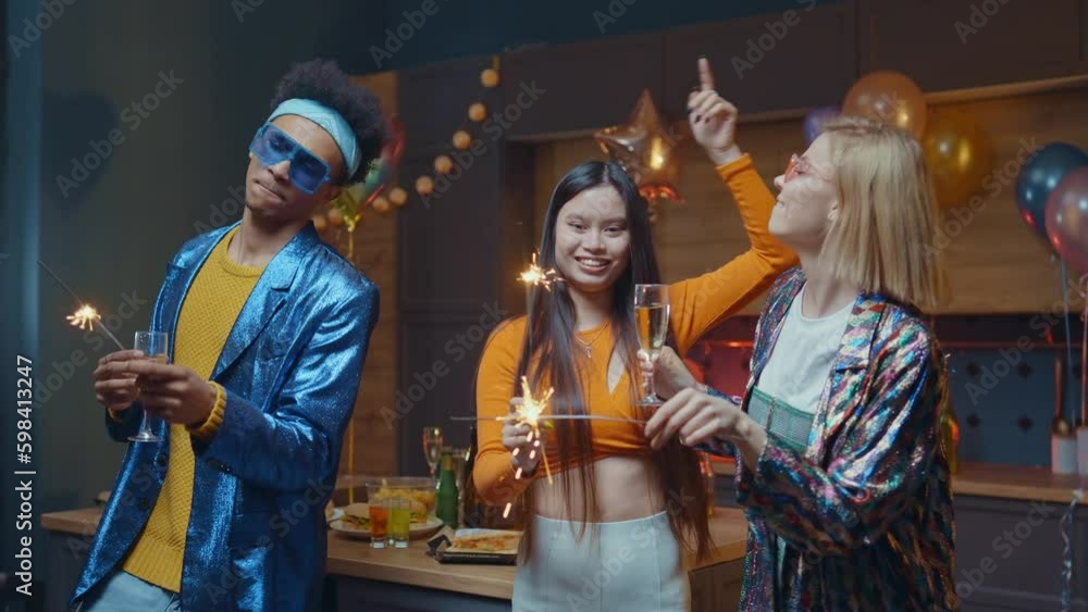 Group of friends making party at home in the living room. Multiethnic ...