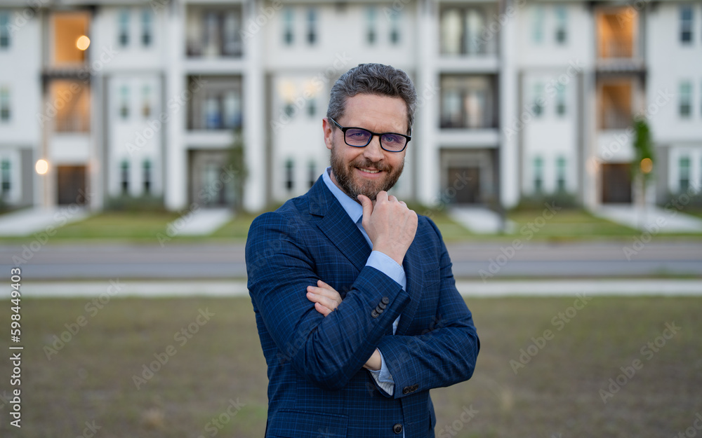 happy salesman in the suit. salesman outdoor. photo of salesman ...