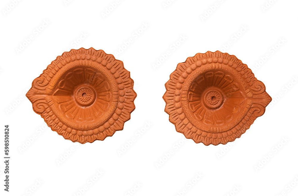 Indian festive clay lamps with floral designs isolated on white ...