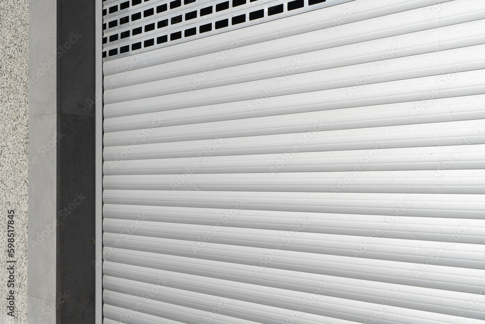Roller shutter gate. Metal roller garage door as background. Automatic ...