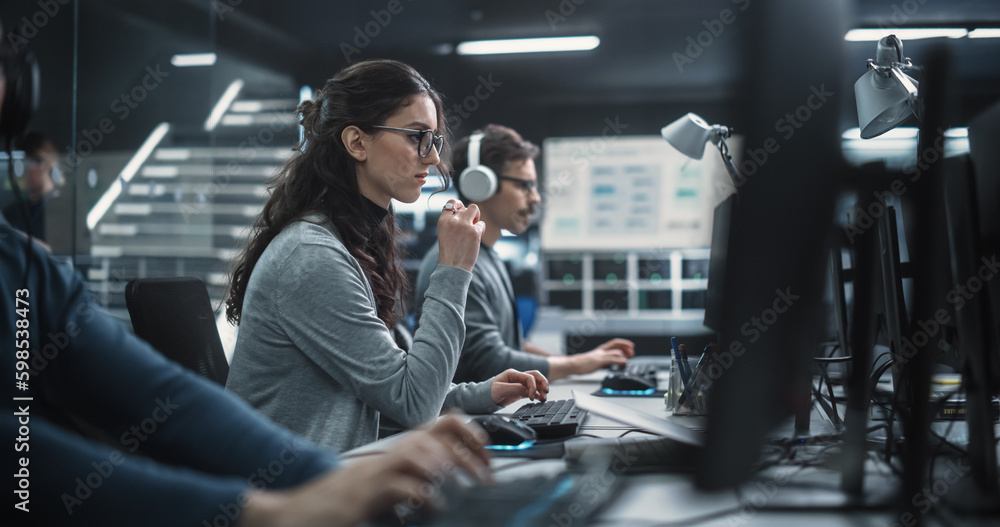 Portrait of a Thoughtful Female Engineer Working on Computer in a ...