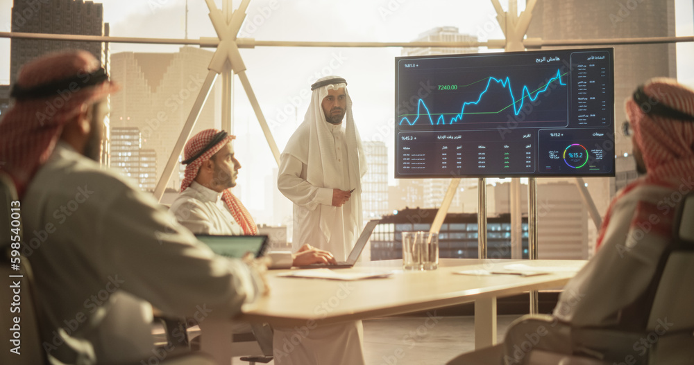 CEO Businessman Shows Data to a Group of Saudi Investors. TV Screen ...