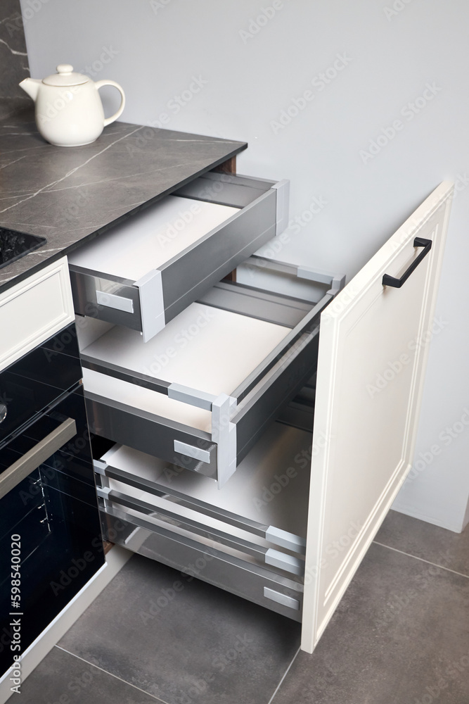 Gas cooker black glass and iron hob on marble light stoneware ...