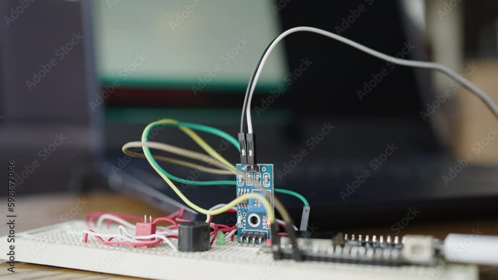 Programming and connecting various devices of the Arduino microcontroller board to measure soil ...