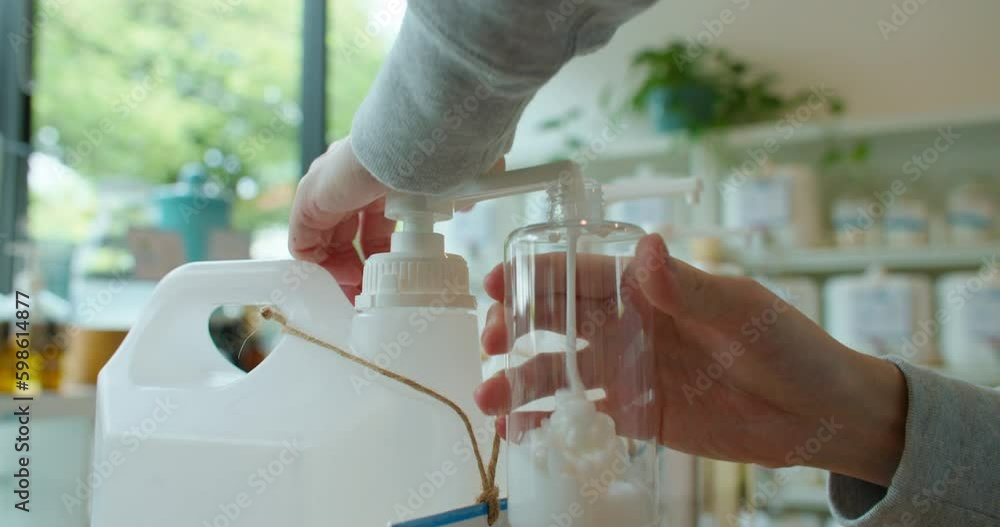 Man bring his own container buying eco bio organic goods in zero waste ...