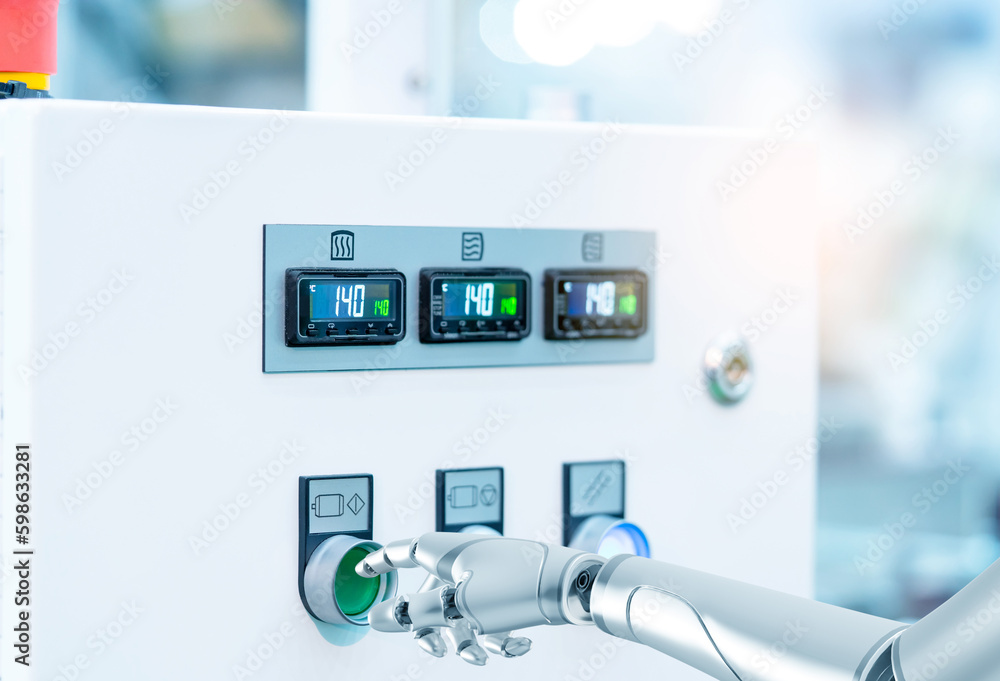 Humanoid robots with robotic arm working in factory production ...