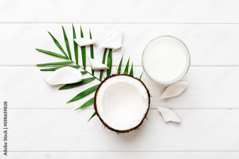 coconut products on white wooden table background. Dairy free milk ...