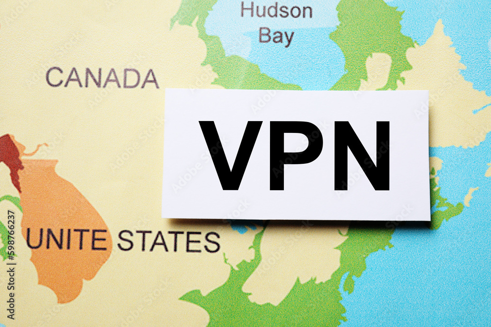 Paper sheet with acronym VPN (Virtual Private Network) on world map ...