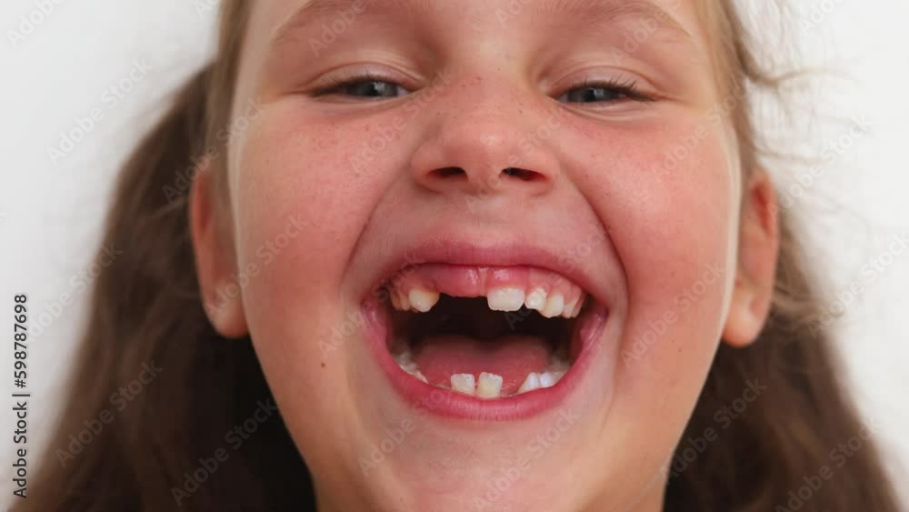 Animation of laughing, playful blond little girl smiling to camera with ...