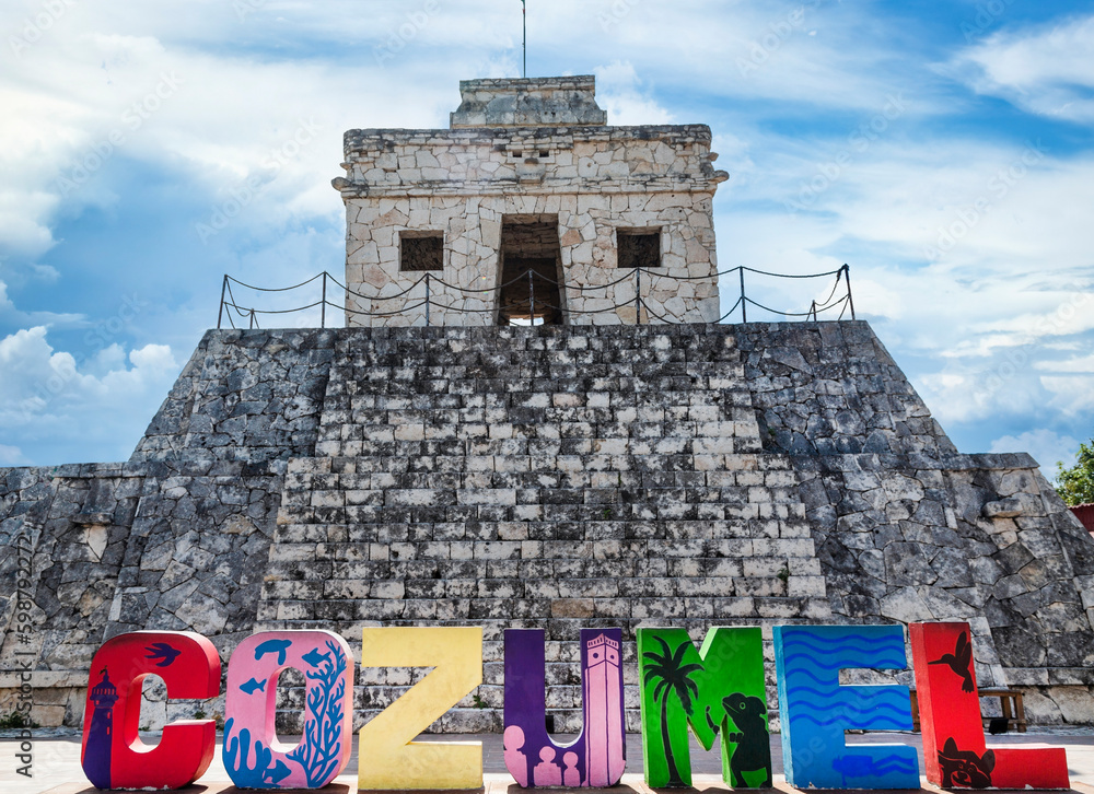 Mayan Temple and colorful Cozumel Sign on the island of Cozumel, Mexico ...